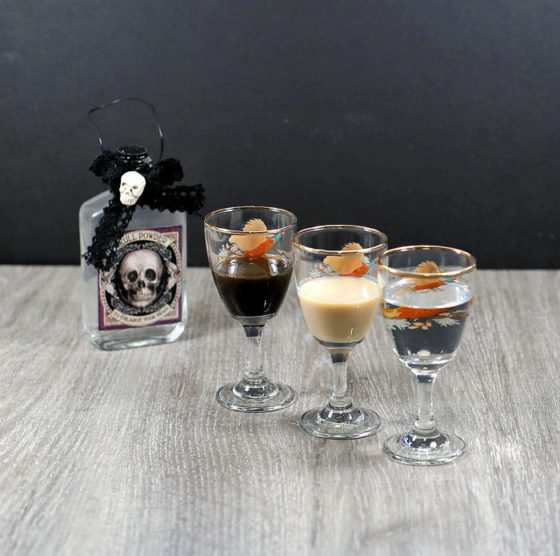 Ghostbuster Cocktail for Halloween with Spooky Whipped Cream Ghosts